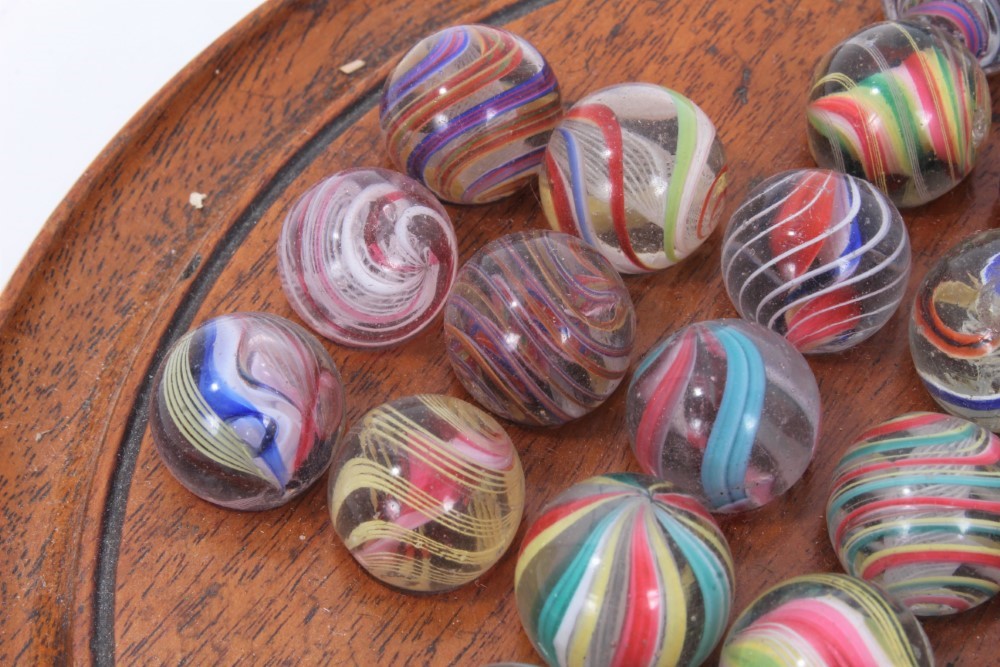 Lot 464 - Victorian glass marbles on a solitaire board