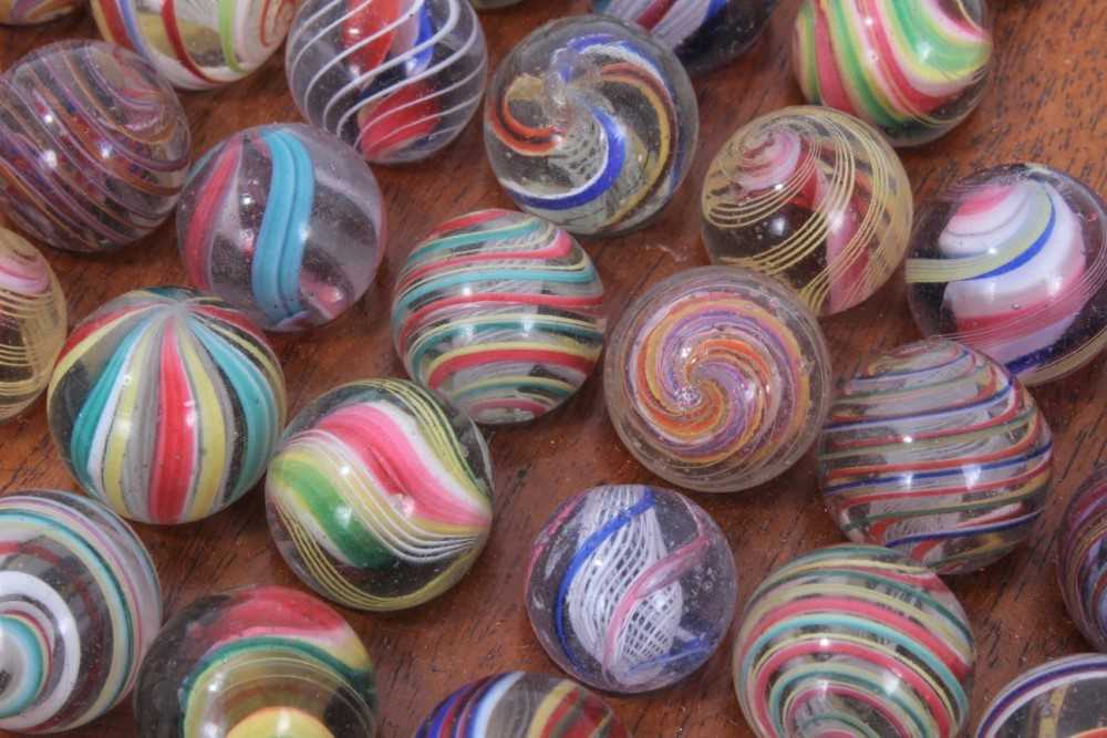 Lot 464 - Victorian glass marbles on a solitaire board