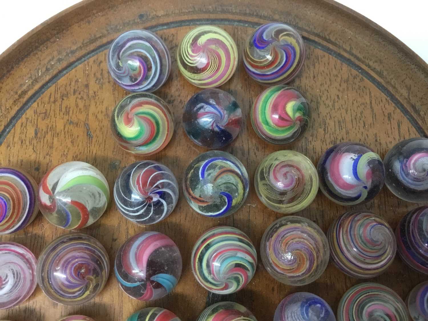 Lot 464 - Victorian glass marbles on a solitaire board