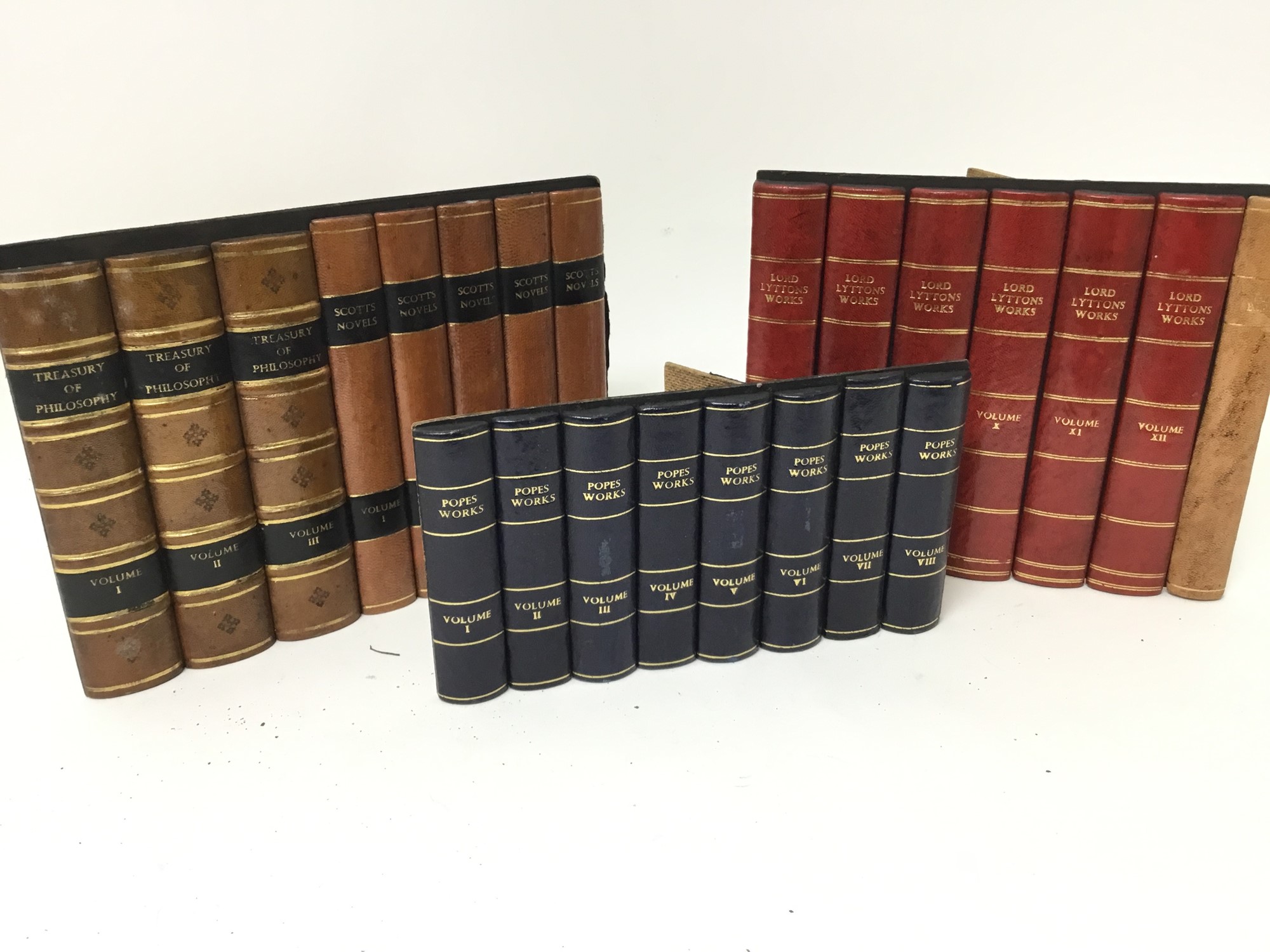 Lot 398 - A large collection of faux book spine panels