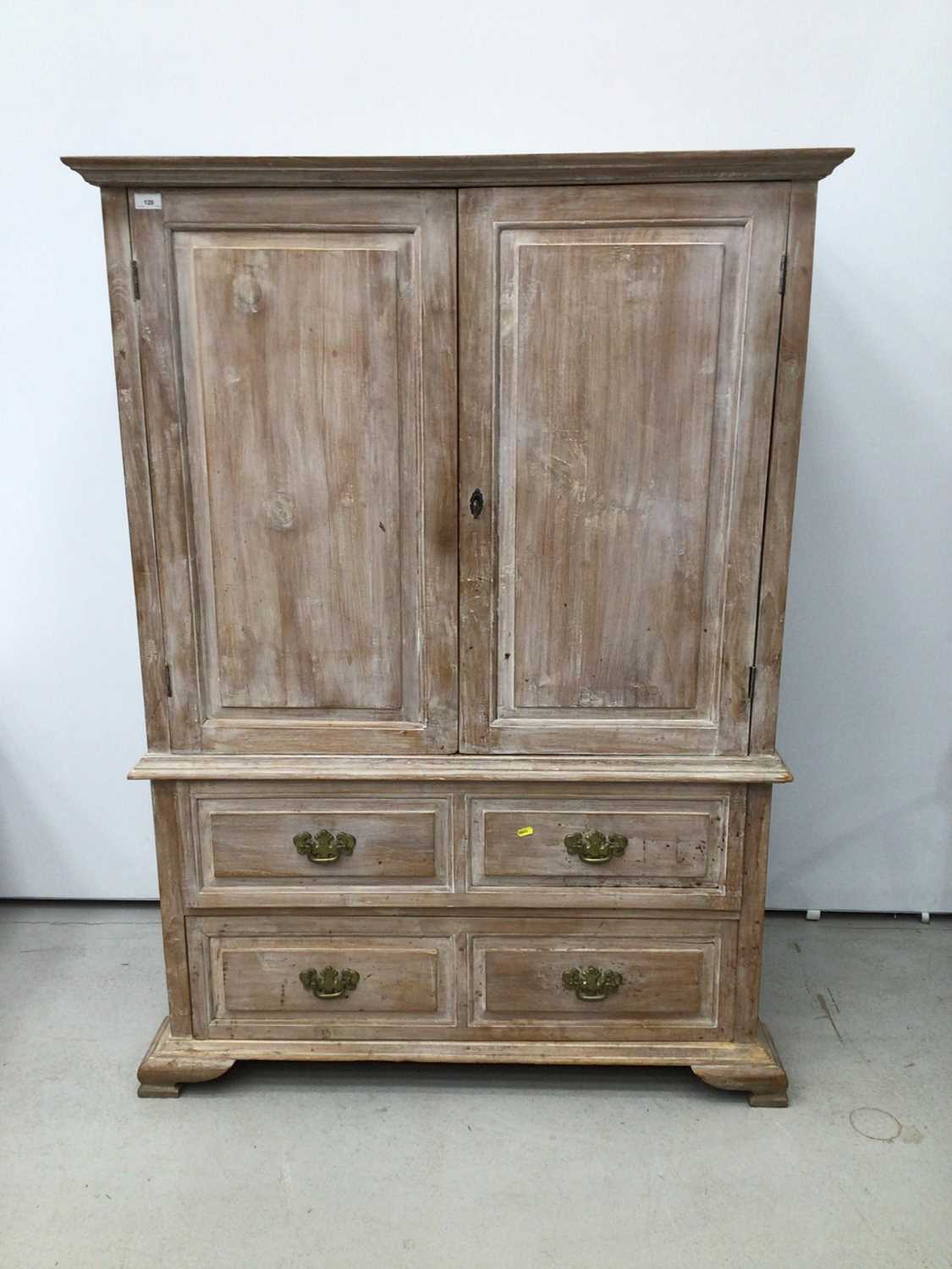 Lot 120 - Georgian style limed oak two height cupboard,