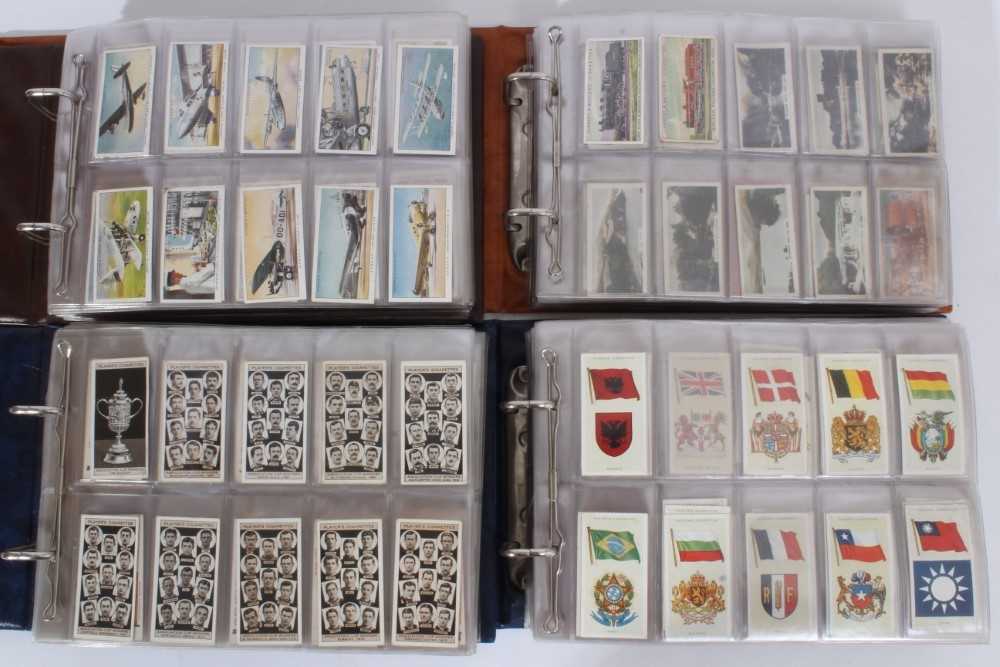 Lot 156 - Cigarette cards - Four binders containing a