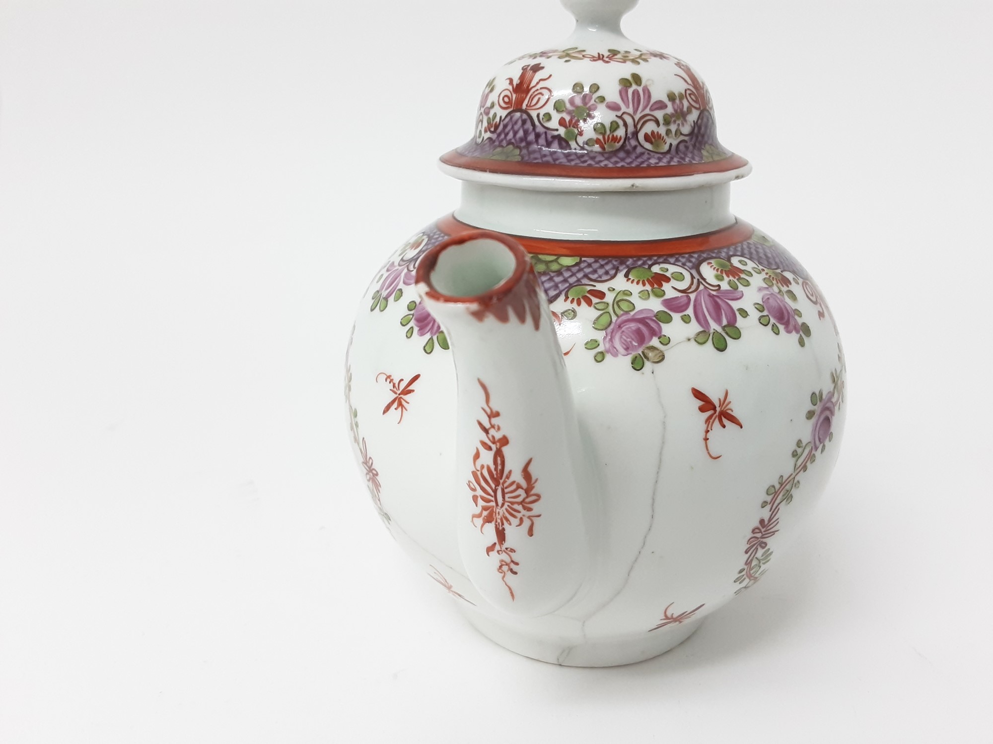 Lot 142 - A Lowestoft polychrome teapot and cover,
