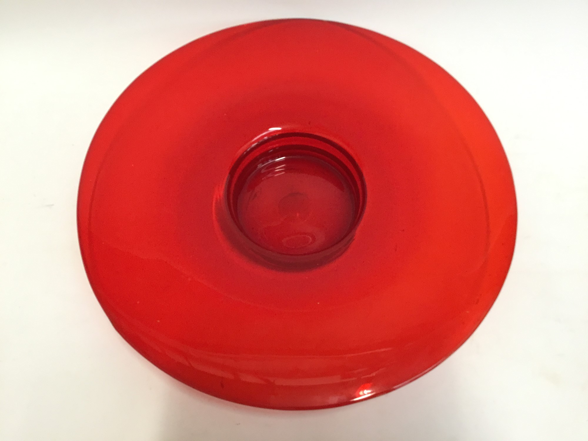 Lot 772 - Large red art glass circular bowl, 45cm