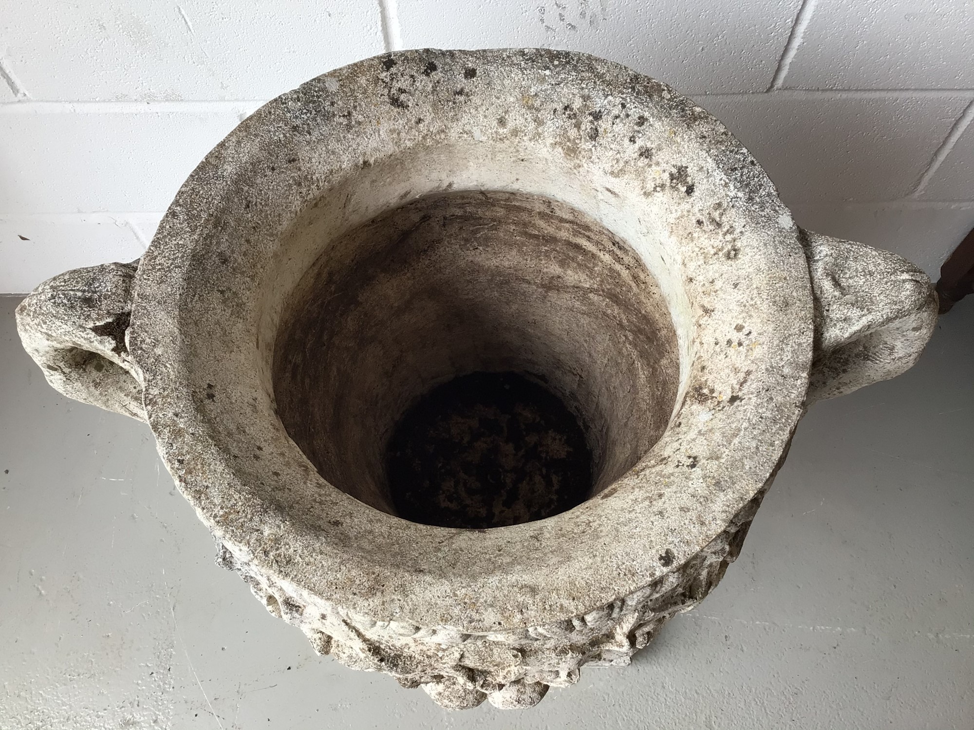 Lot 151 - Large concrete urn with floral decoration