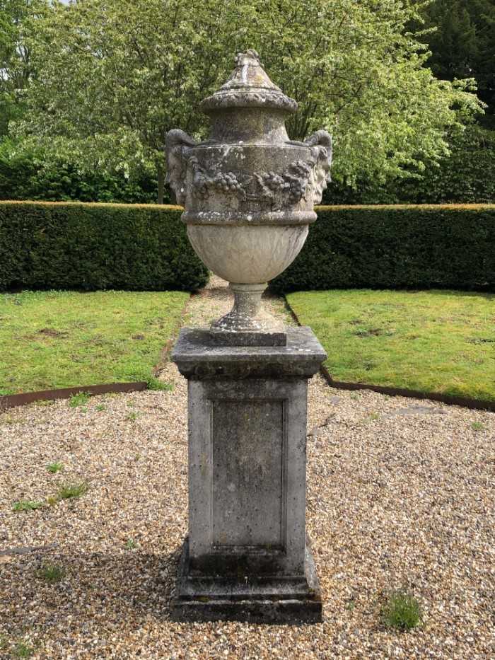 Lot 1403 - Classical urn on square base, 185cm high,