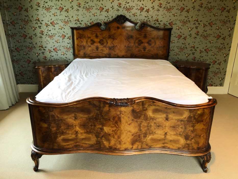 Lot 1428 - Early 20th century walnut bedstead, the