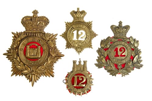 Lot 172 - Three 12th (Suffolk) Regiment badges and