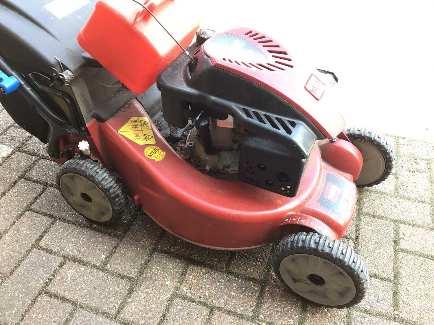 Lot 57 - Toro TX - 159 petrol lawn mower with grass