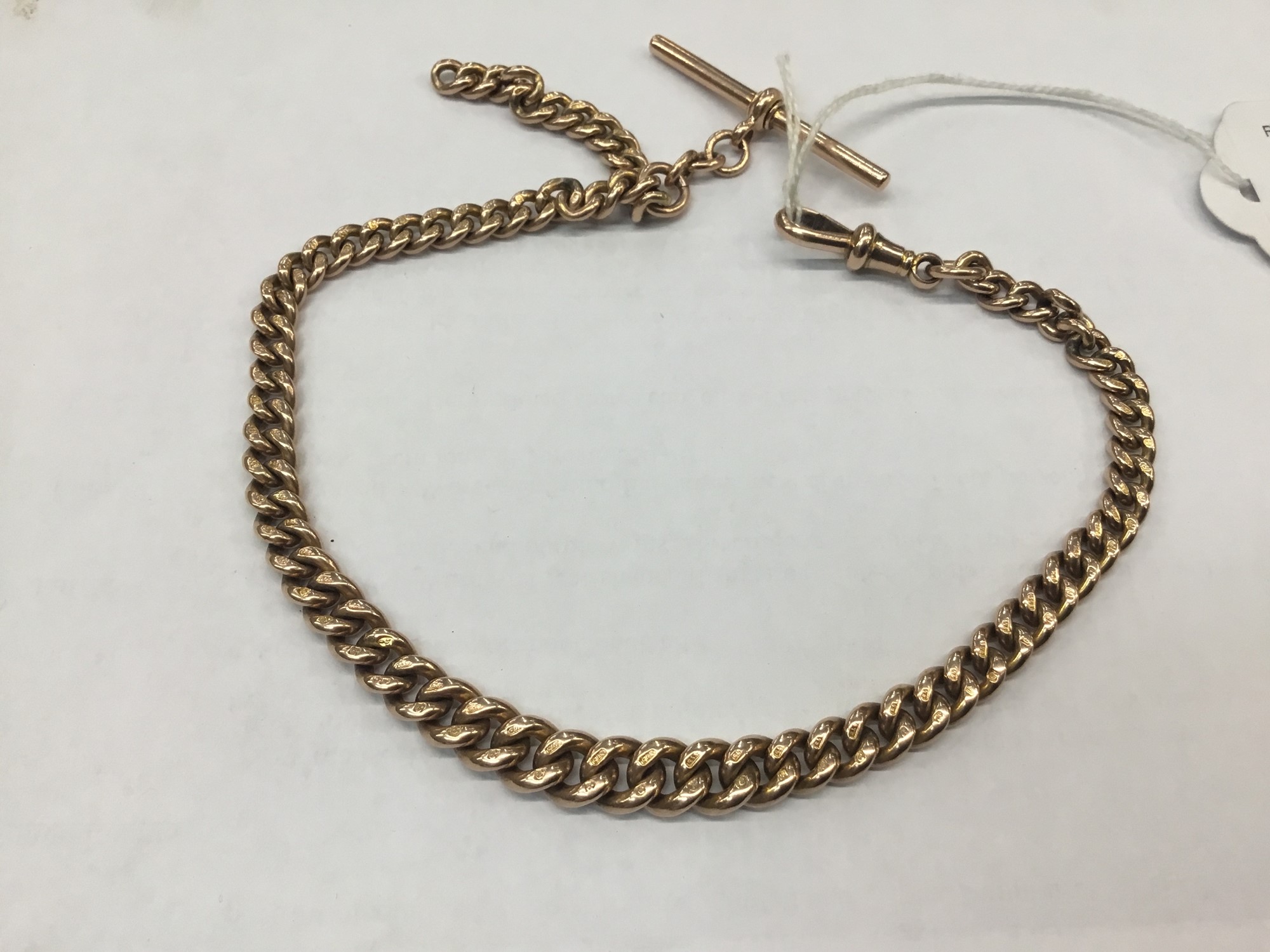 Lot 646 - Edwardian 9ct rose gold watch chain
