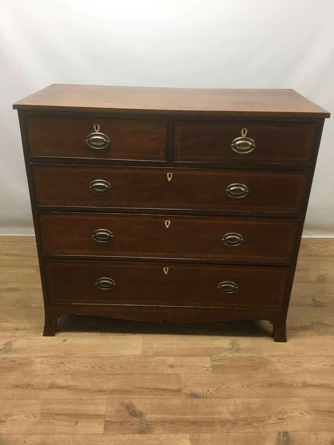 Lot 1433 - George IV mahogany chest of two short and