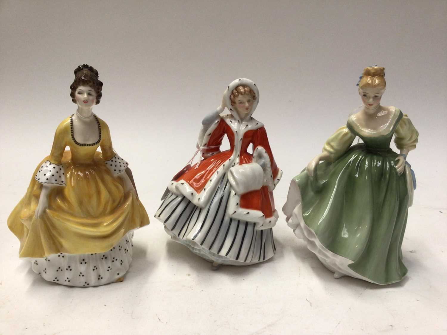 Lot 1027 - Three Royal Doulton figures - Noelle HN2179,