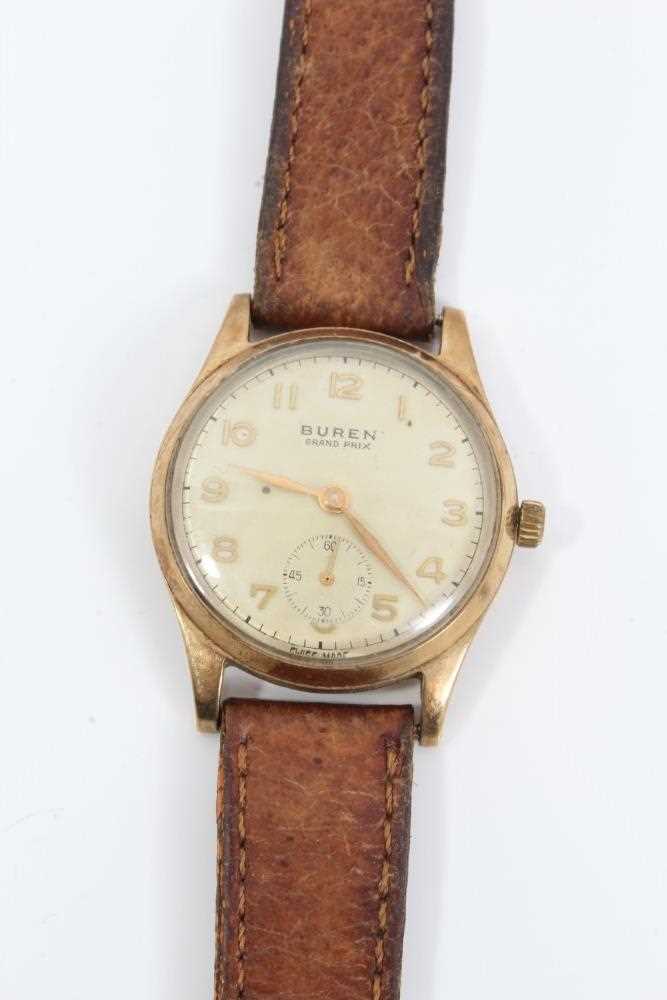 Lot 211 - 9ct gold vintage Buren wristwatch on brown