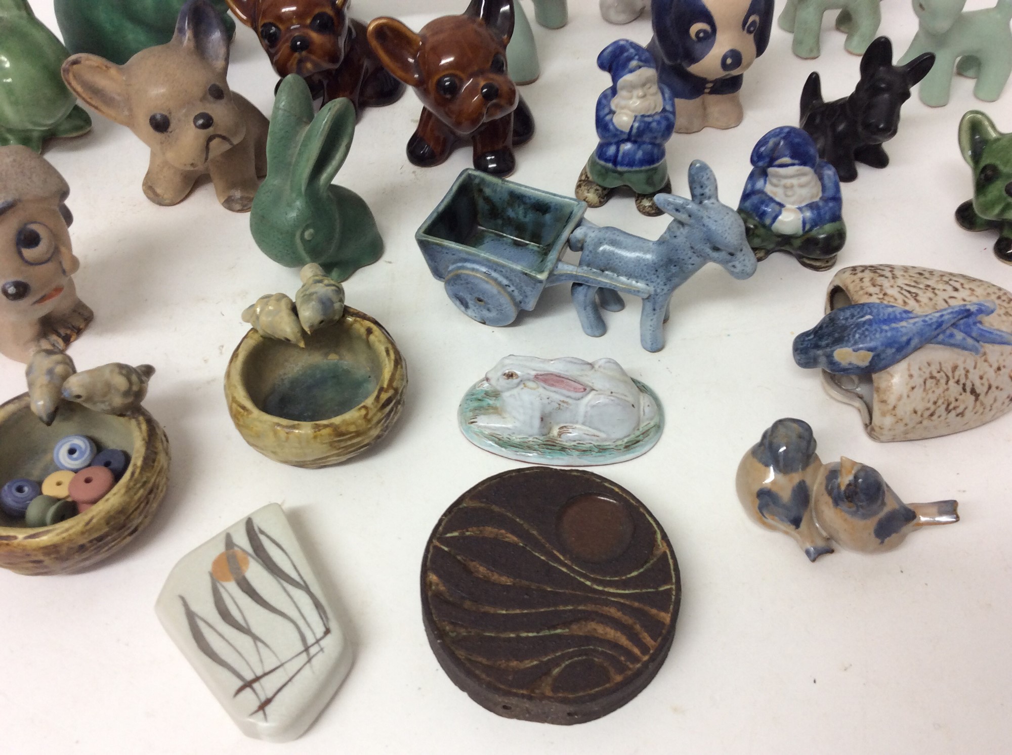 Lot 1070 - Collection of pottery animal ornaments