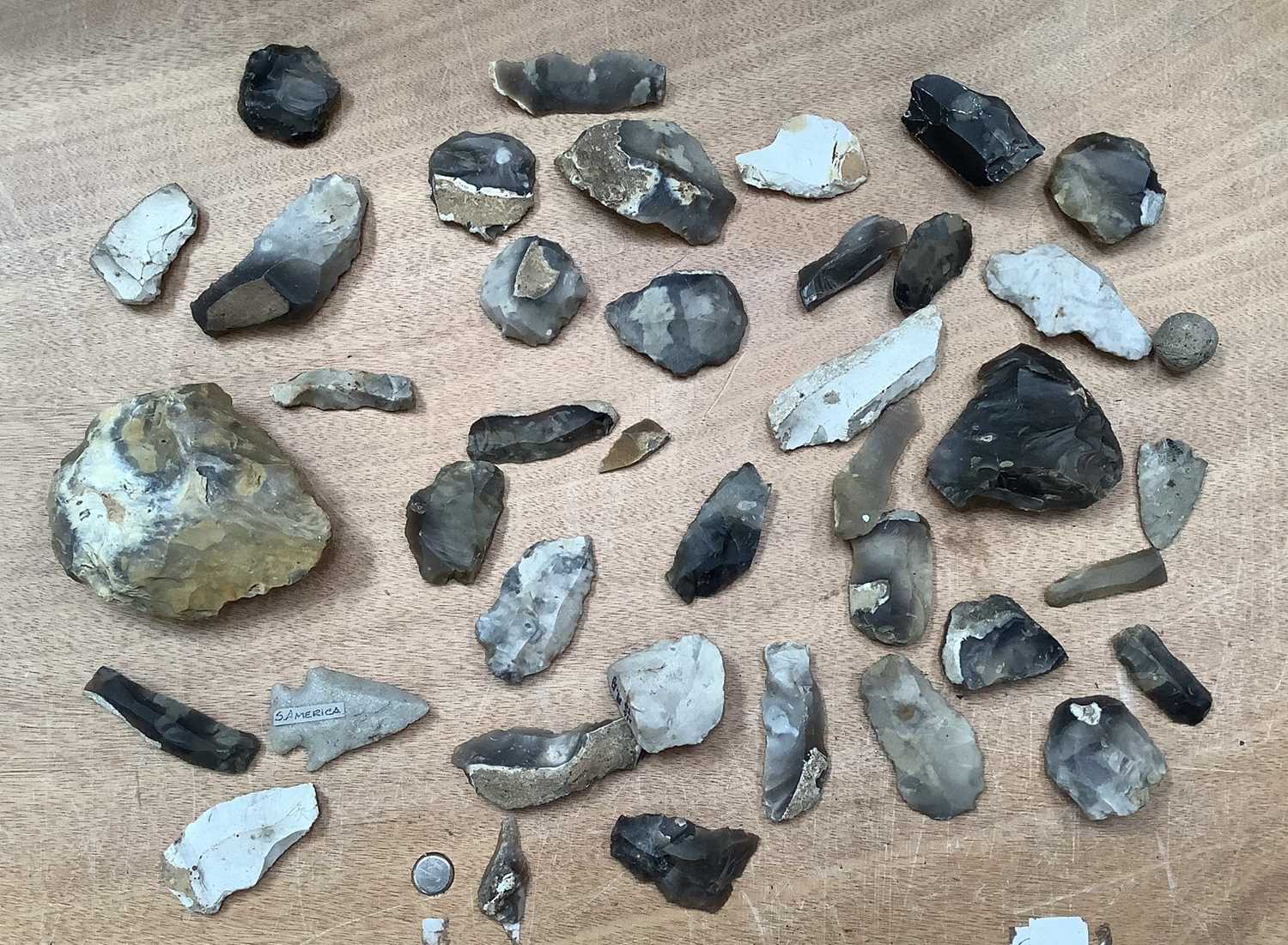 Lot 2458 - One box of worked flint tools, axe heads