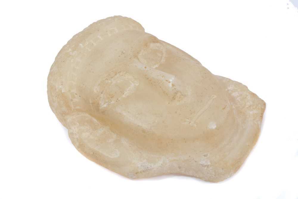 Lot 856 - Ancient carved alabaster head, probably