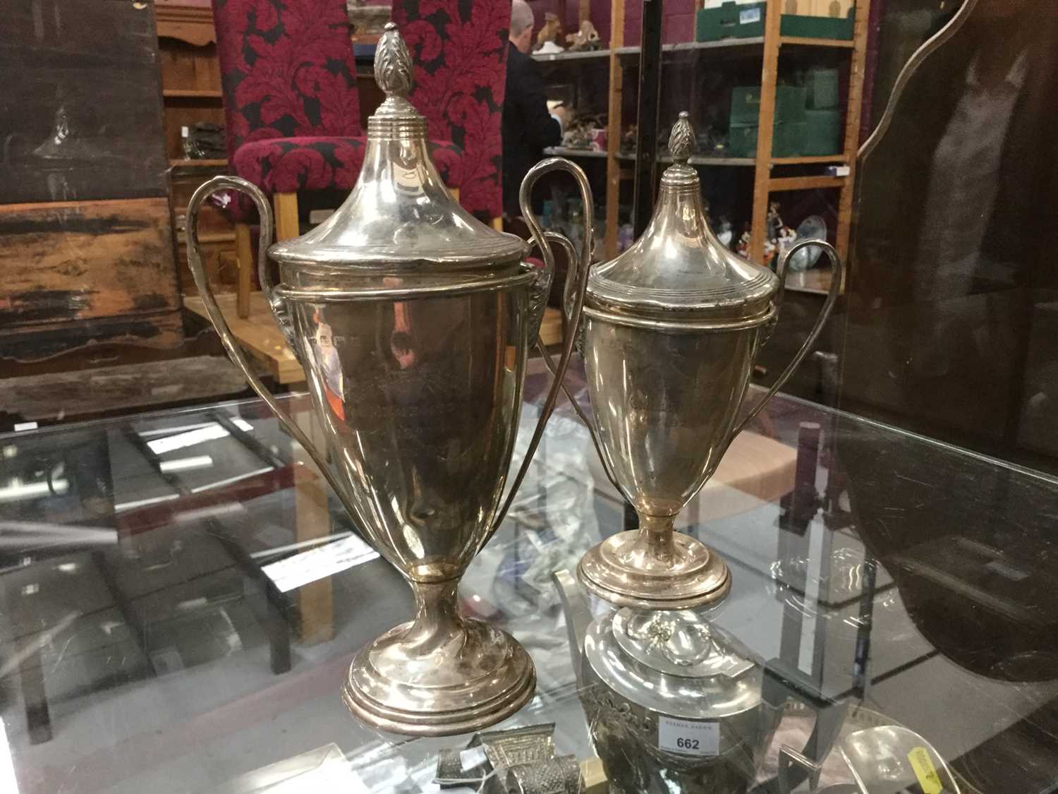 Lot 697 - Pair of silver two handled trophy cups and