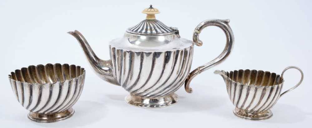 Lot 299 - Victorian silver three piece batchelor tea