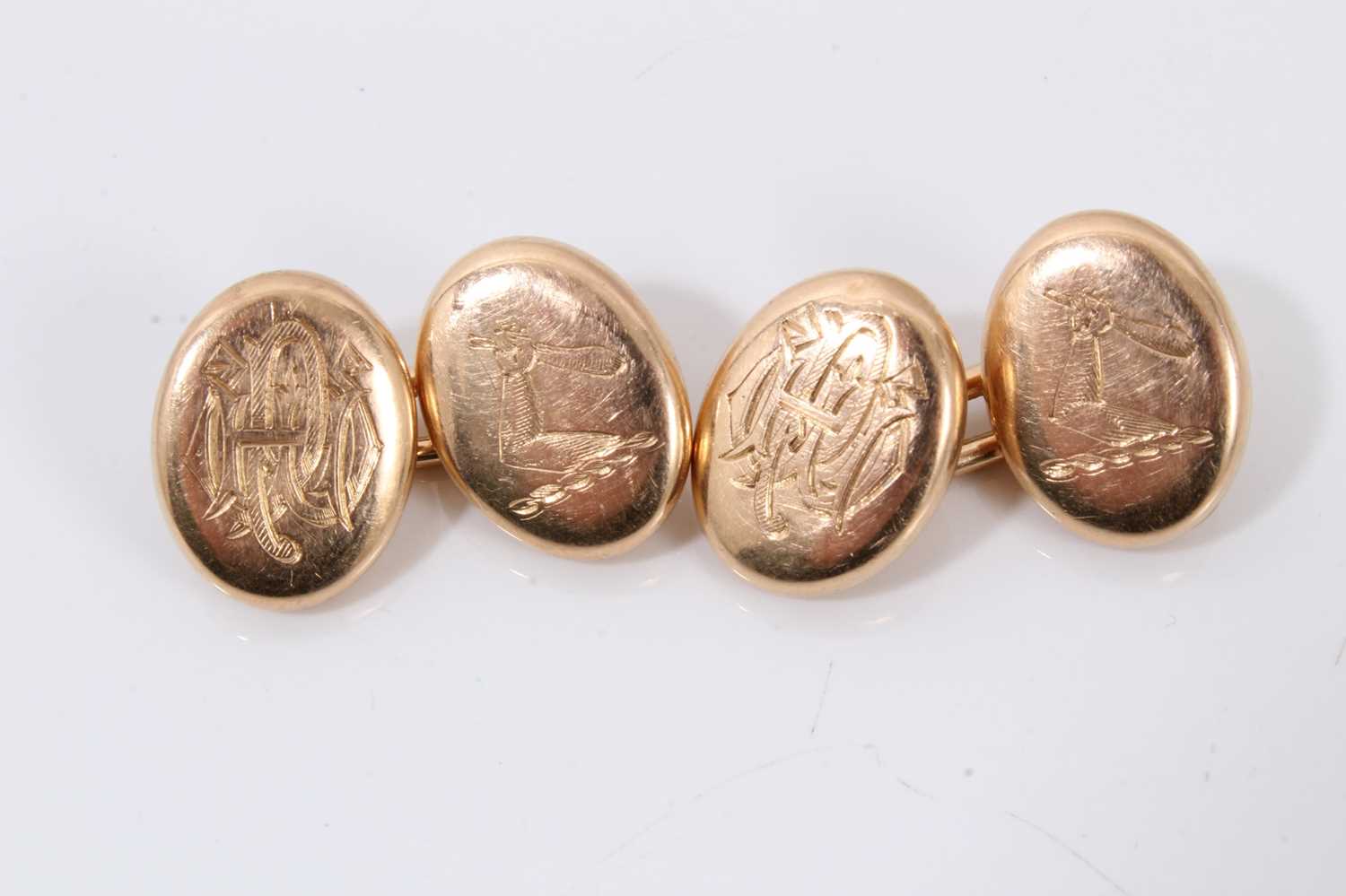 Lot 524 - Pair of Edwardian gold cufflinks with