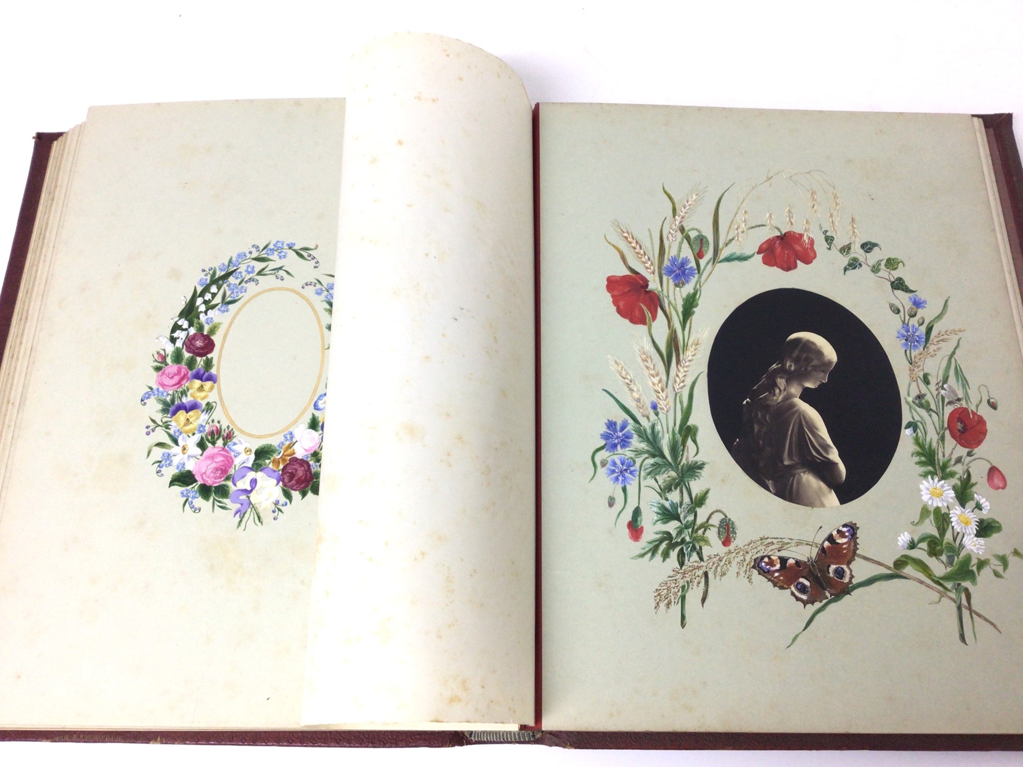 Lot 134 - A charming Victorian illuminated album, red